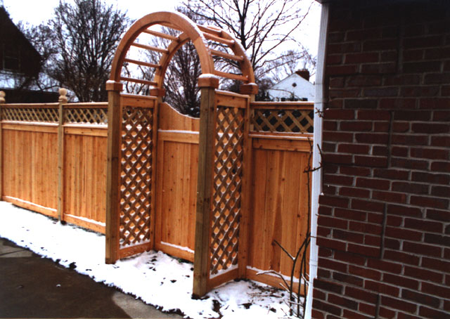 Custom garden arbor by Elyria Fence